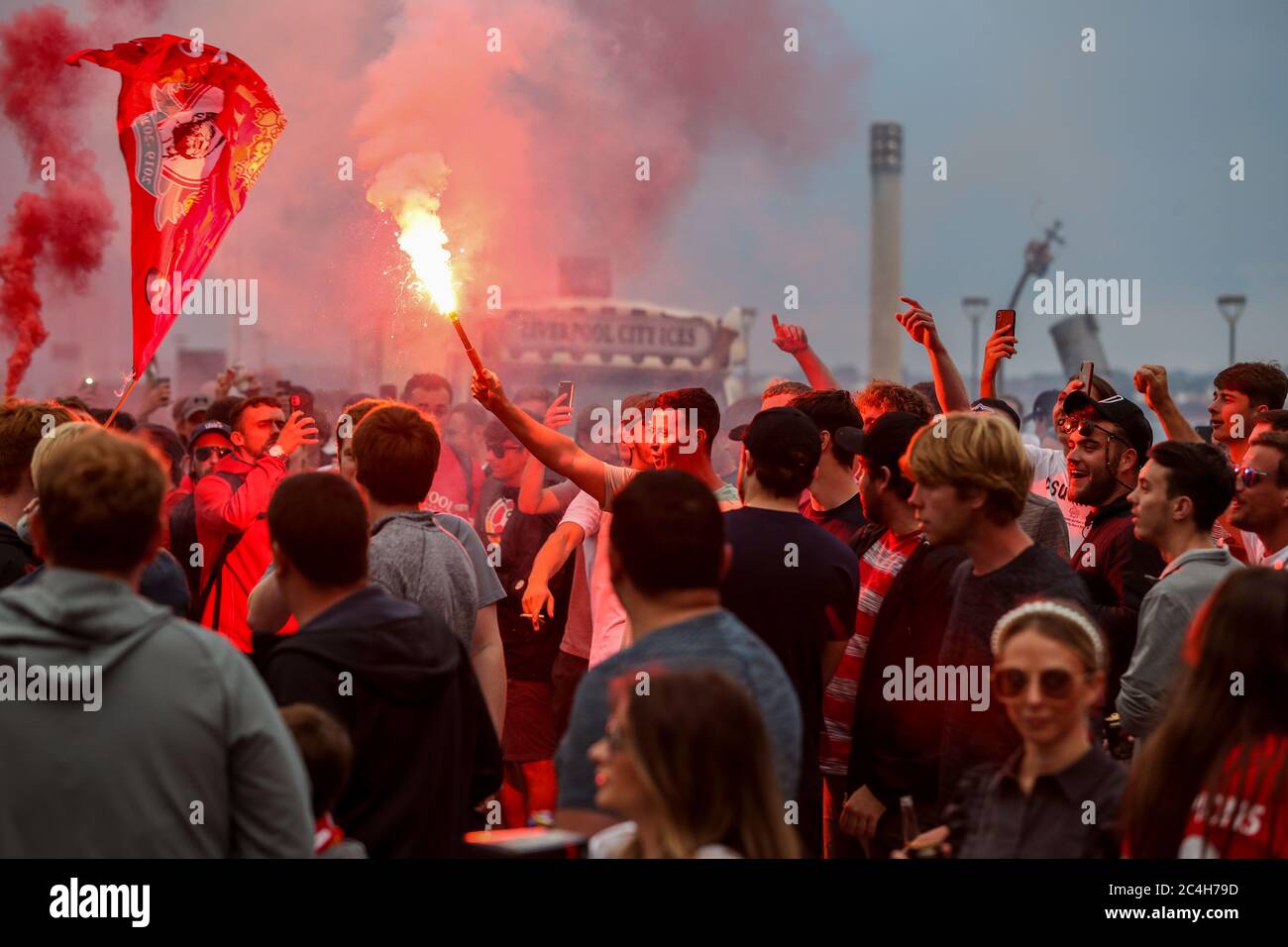 Liverpool fans let off flares outside the Liver Building in Liverpool ...