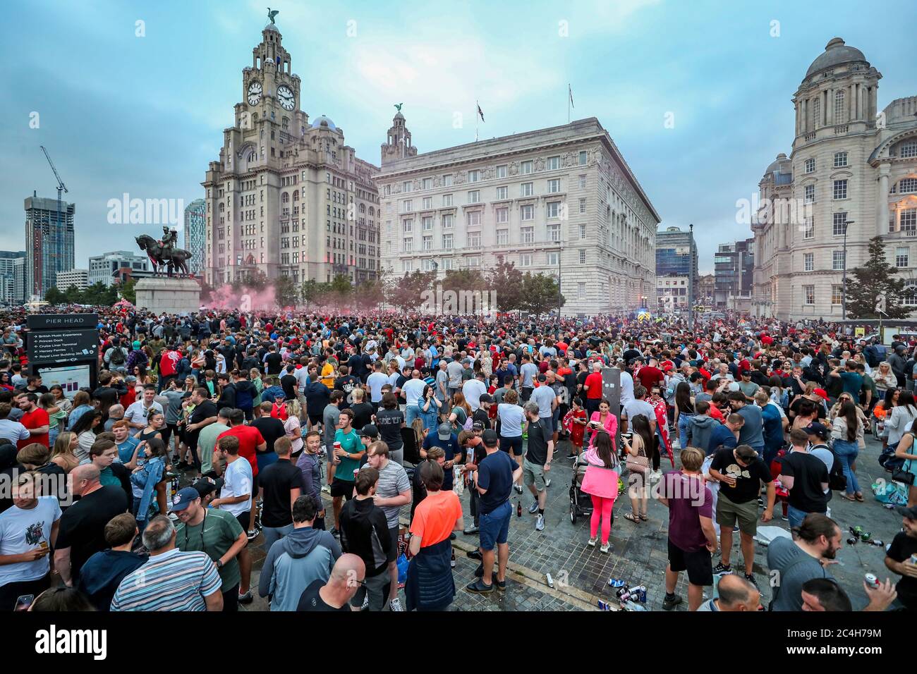 Liverpool fans let off flares outside the Liver Building in Liverpool ...