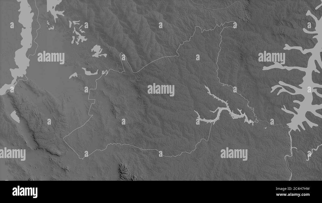 Caaguazú, department of Paraguay. Grayscaled map with lakes and rivers. Shape outlined against ...