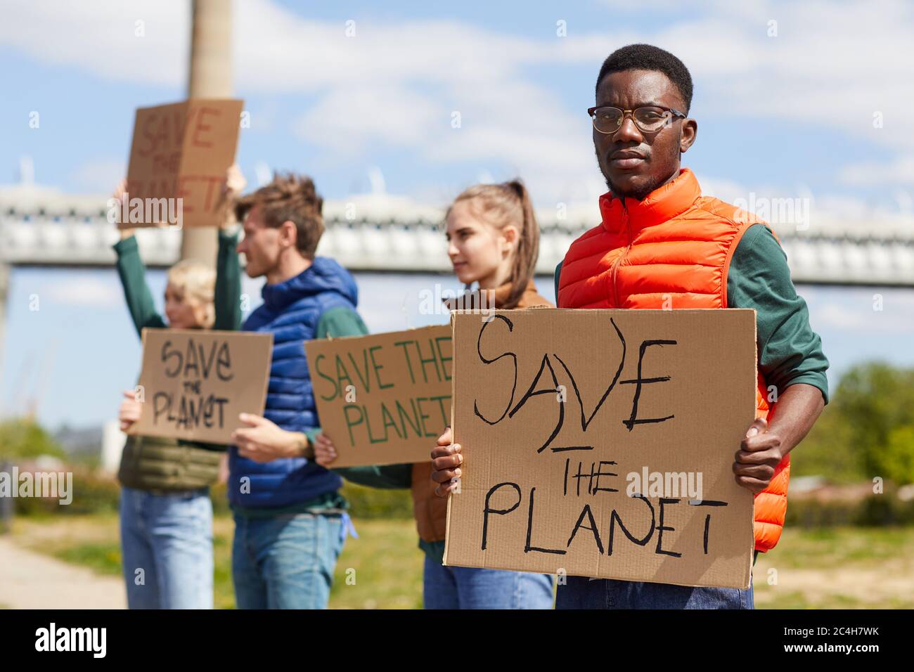 Standing holding placard text protestor social issues hi-res stock ...