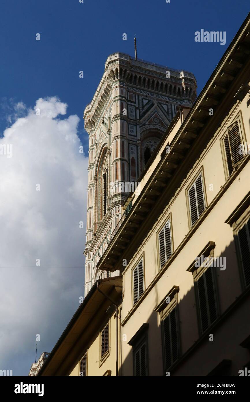Glimpse of Giotto's bell tower from the streets of the city of Florence ...