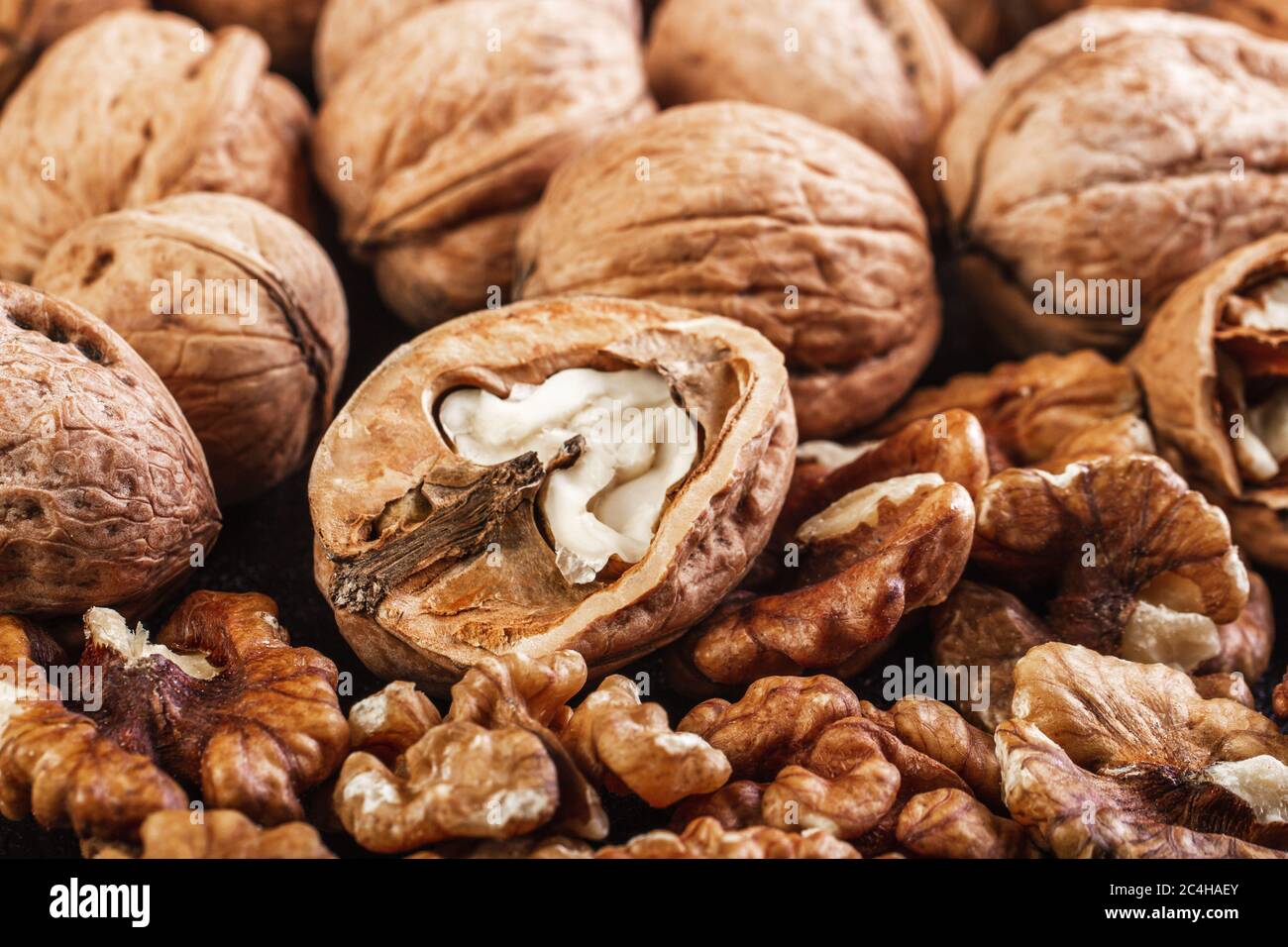 walnut in shells and peeled Stock Photo - Alamy
