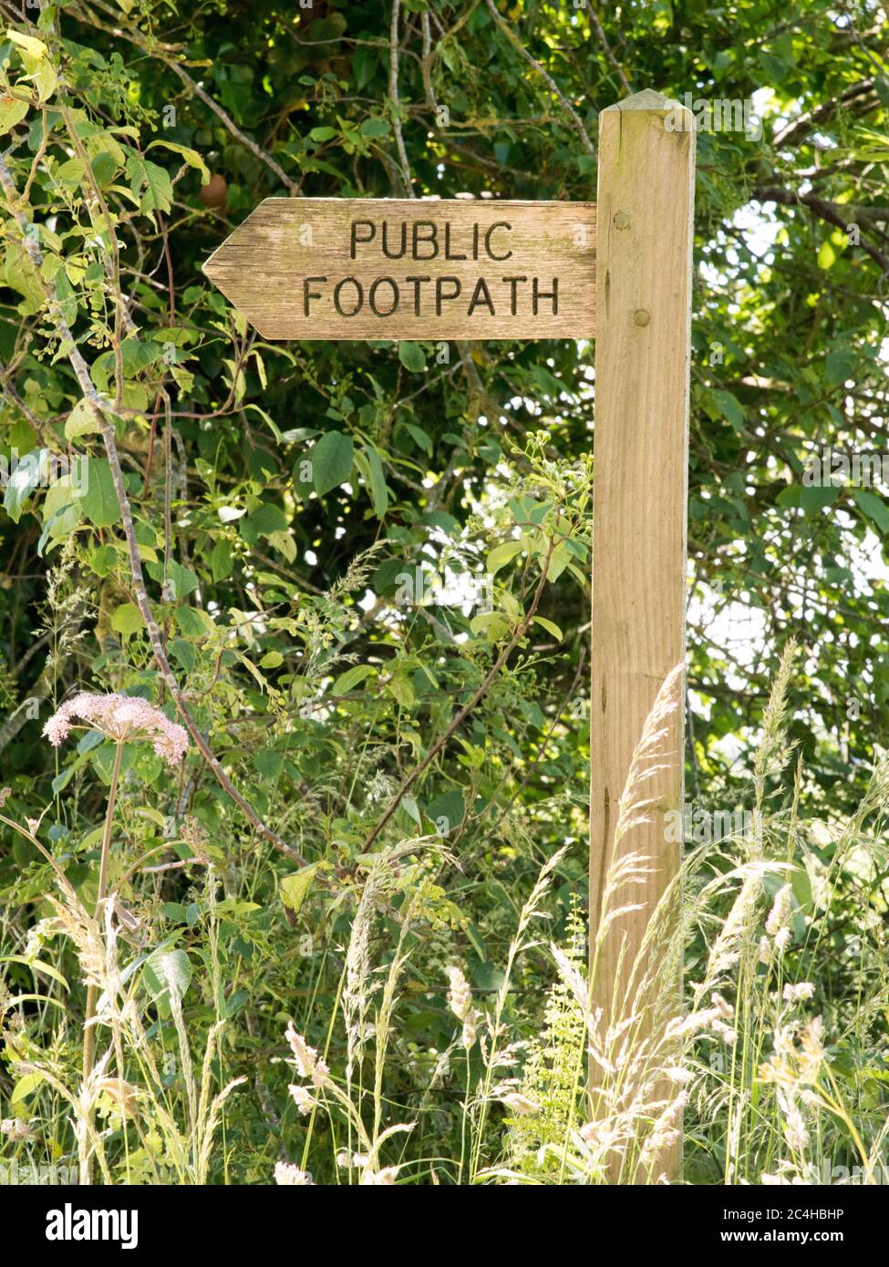 Wooden public footpath sign Stock Photo - Alamy