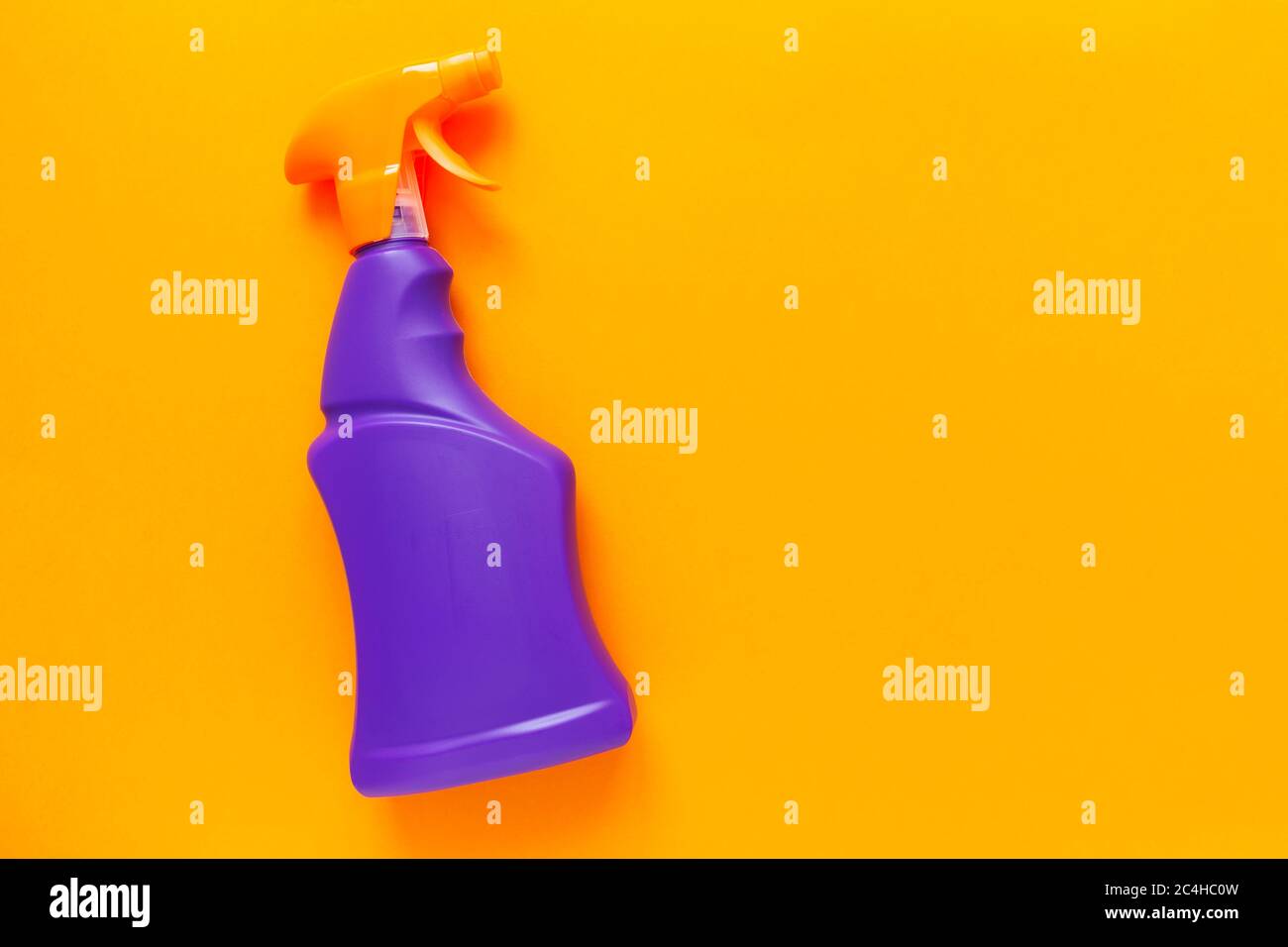 Detergents and cleaning products agent, orange background. Top view ...