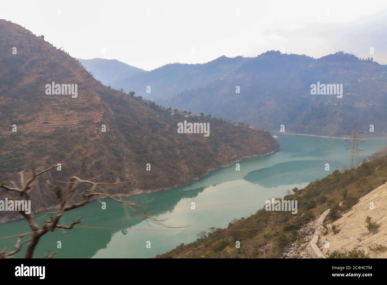 A river flowing between two mountains. focus on infinity Stock Photo ...