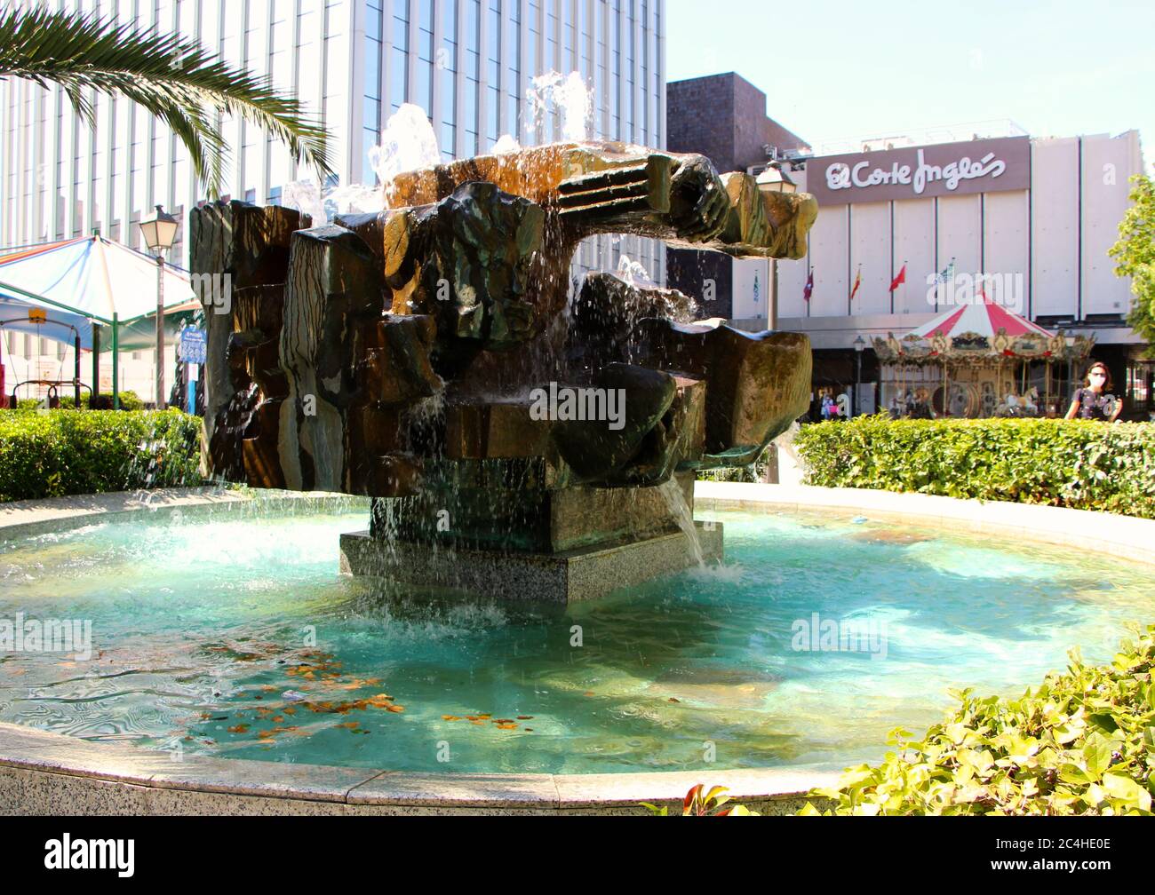 Abstract sculpture fountain next to El Corte Ingles department store ...