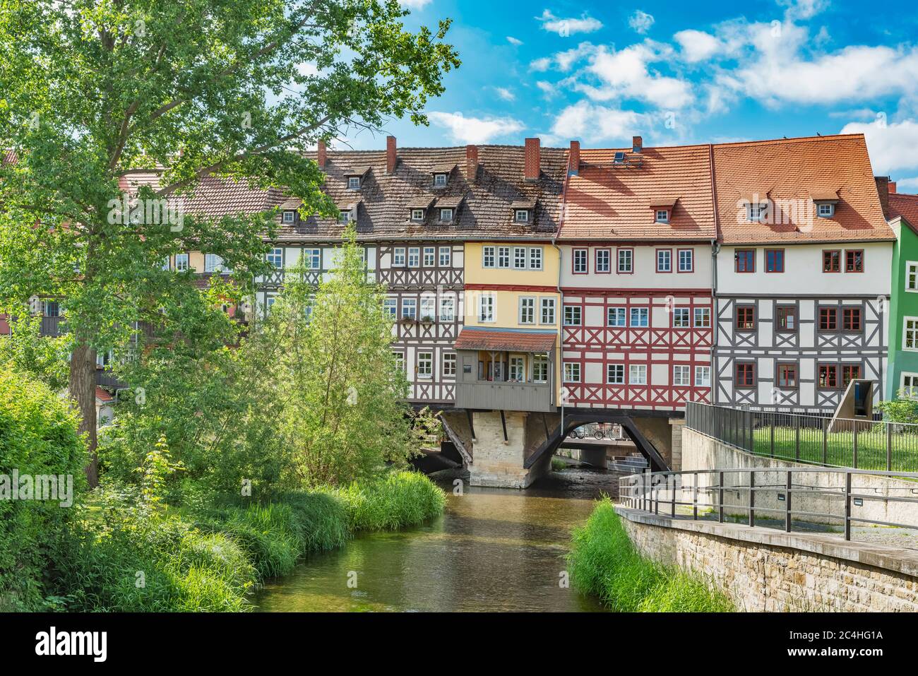 View over the river Gera to the houses of the Kraemerbruecke. The ...