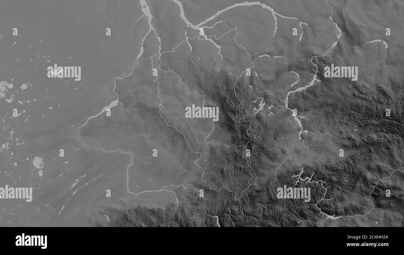 Kemerovo, region of Russia. Grayscaled map with lakes and rivers. Shape outlined against its ...