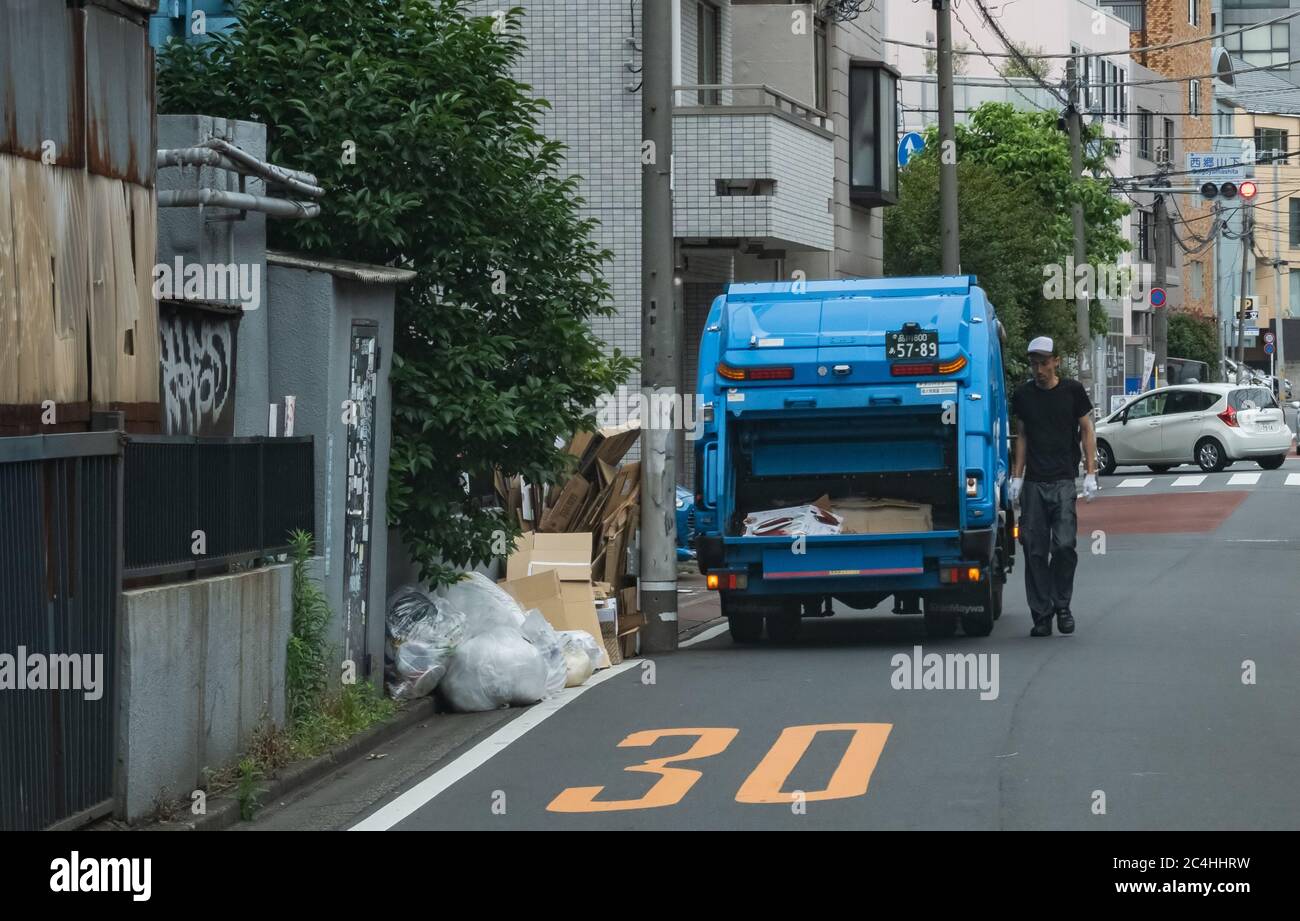 Worker at rubbish dump hi-res stock photography and images - Alamy