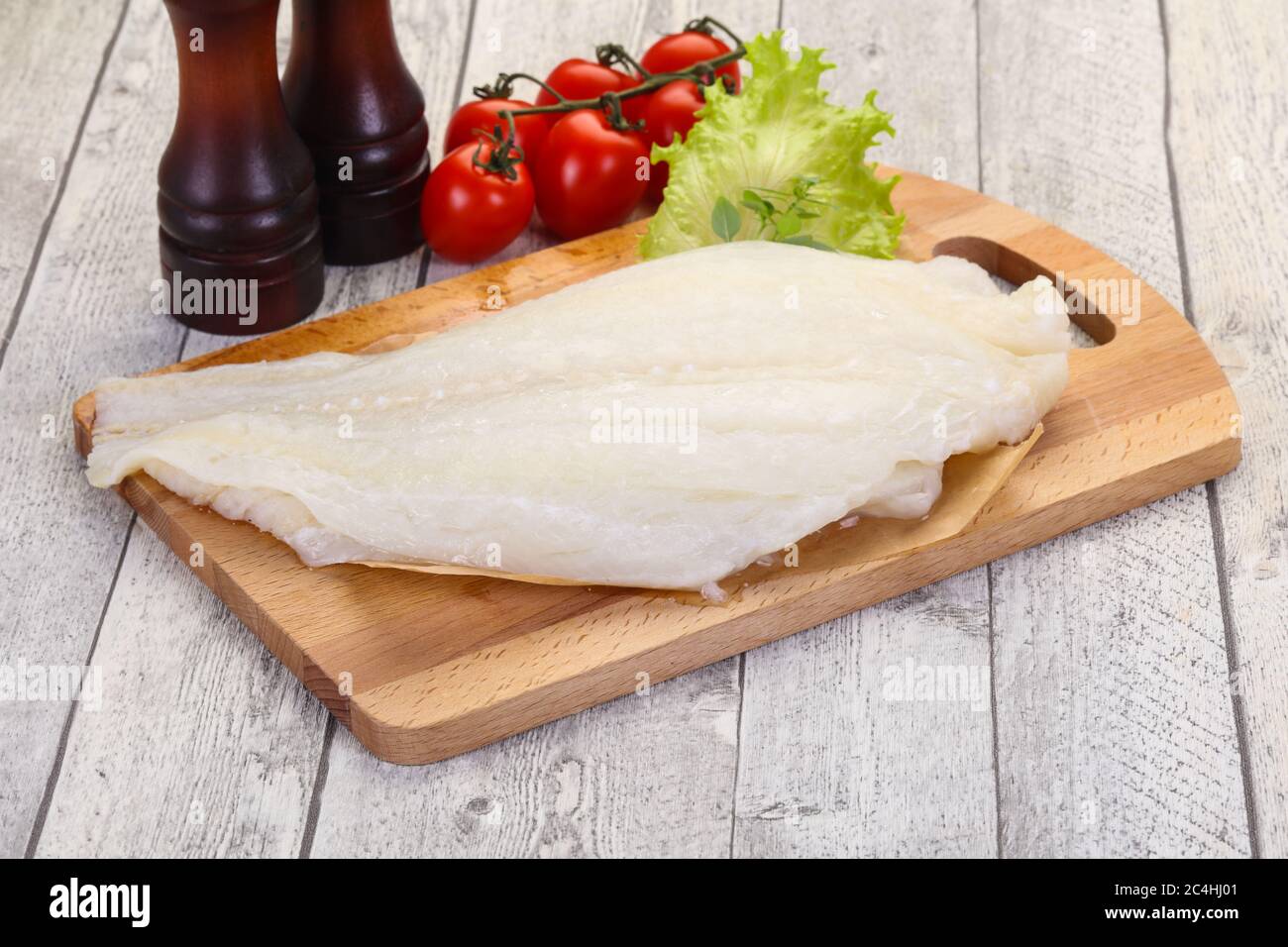 Raw halibut fillet ready for cooking Stock Photo - Alamy
