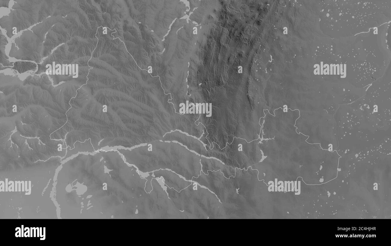 Orenburg, region of Russia. Grayscaled map with lakes and rivers. Shape outlined against its ...