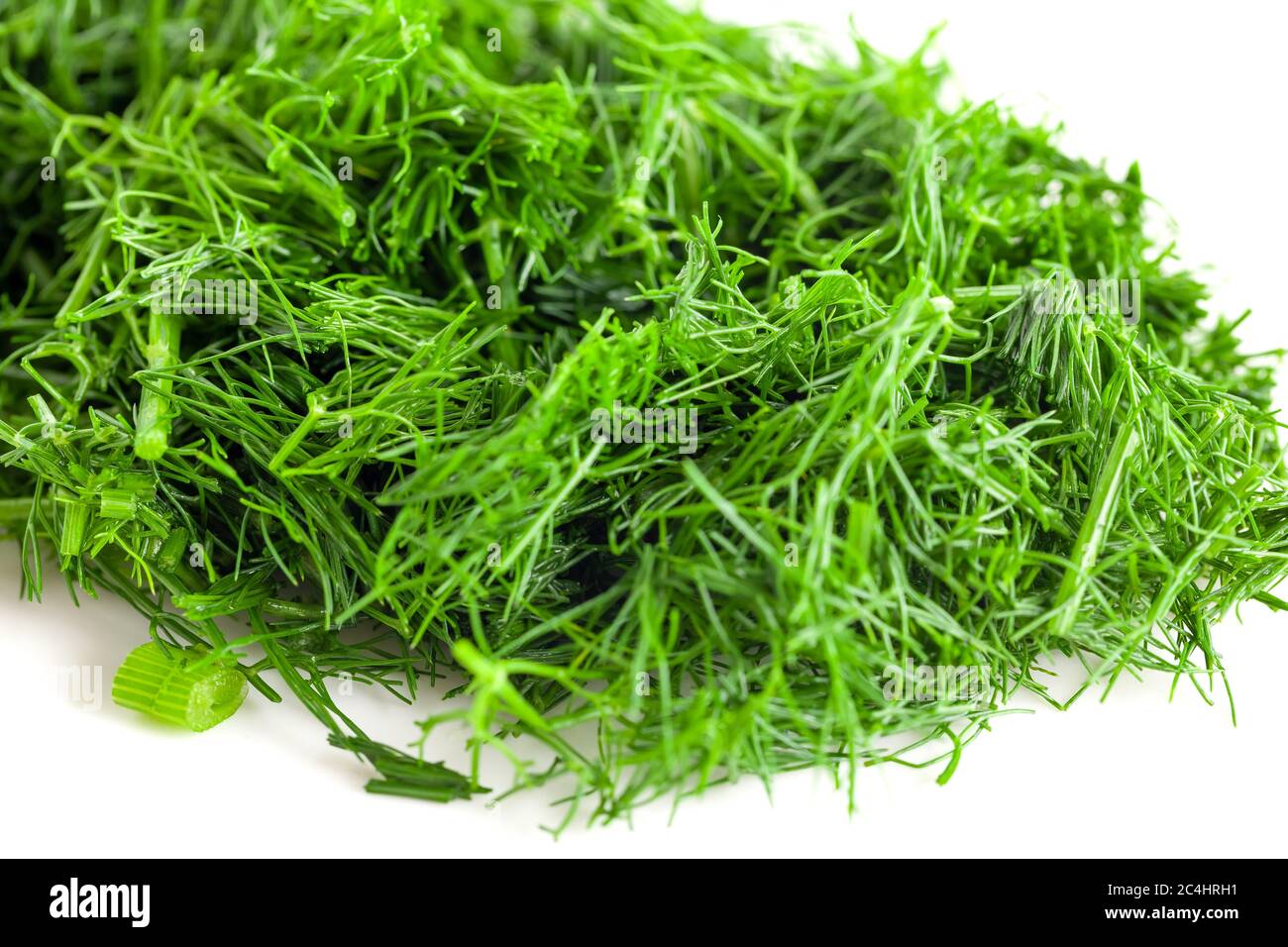Chopped into small pieces dill isolated on white background, fresh dill ...