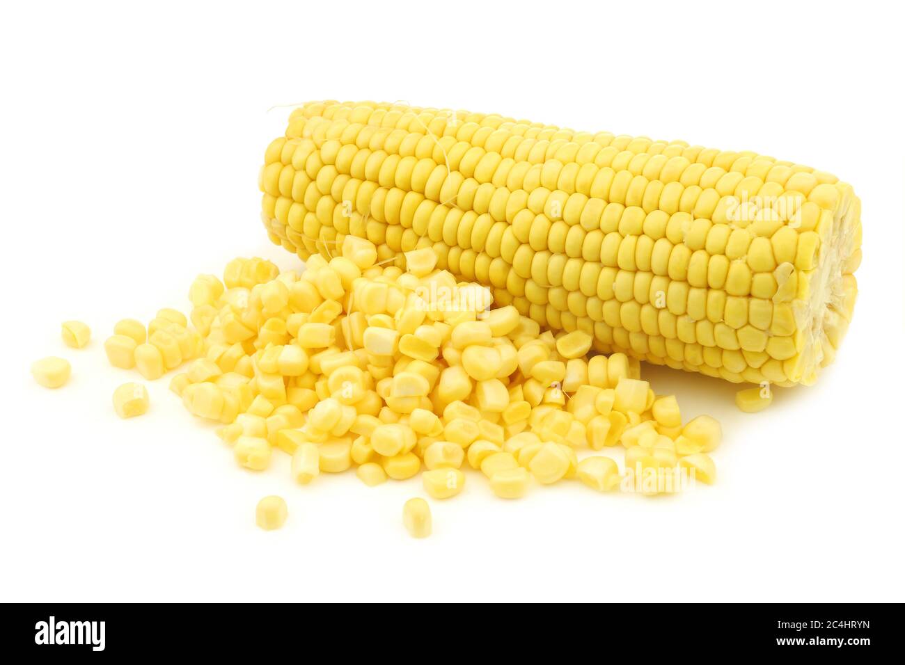 fresh corn on the cob and some kernels on a white background Stock ...