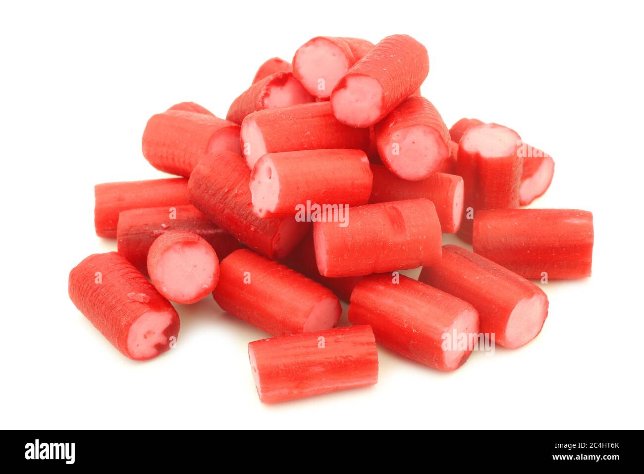 Red candy candy with pink filling on a white background Stock Photo - Alamy