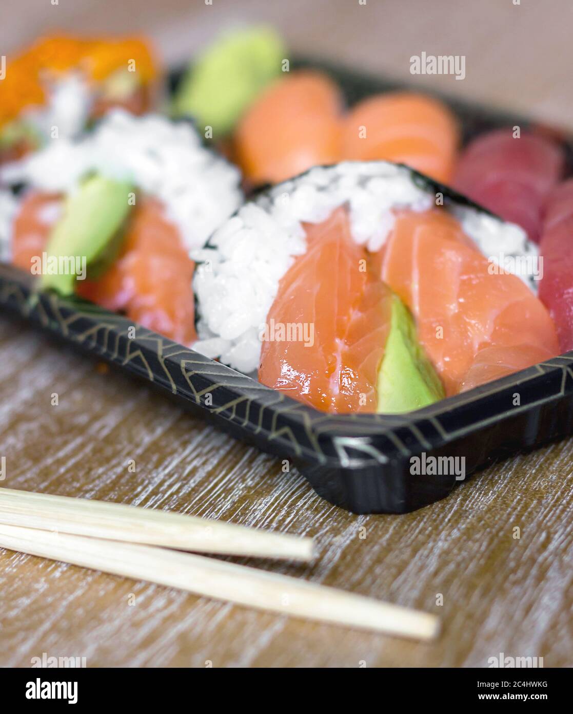Japanese seafood sushi. Closeup of fresh sushi on rustic wooden table ...