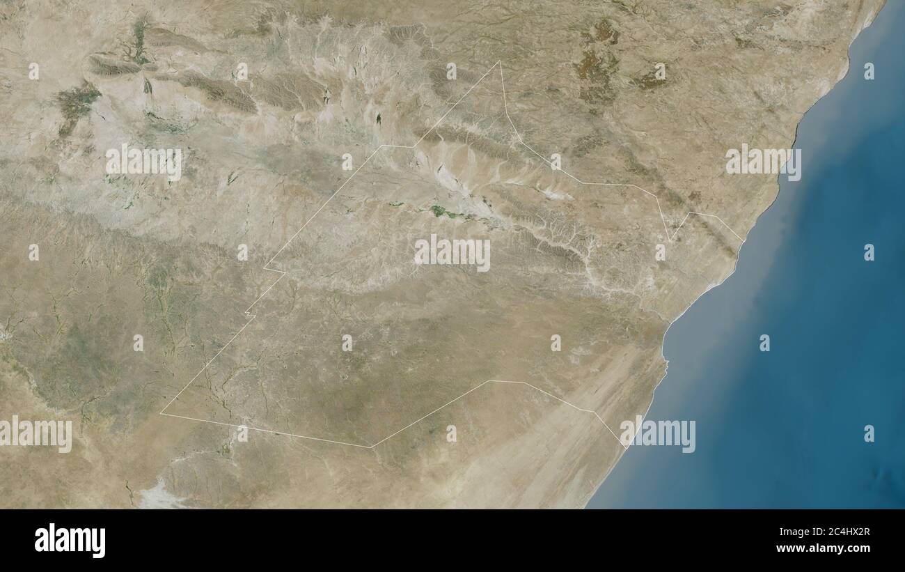 Nugaal, region of Somalia. Satellite imagery. Shape outlined against ...