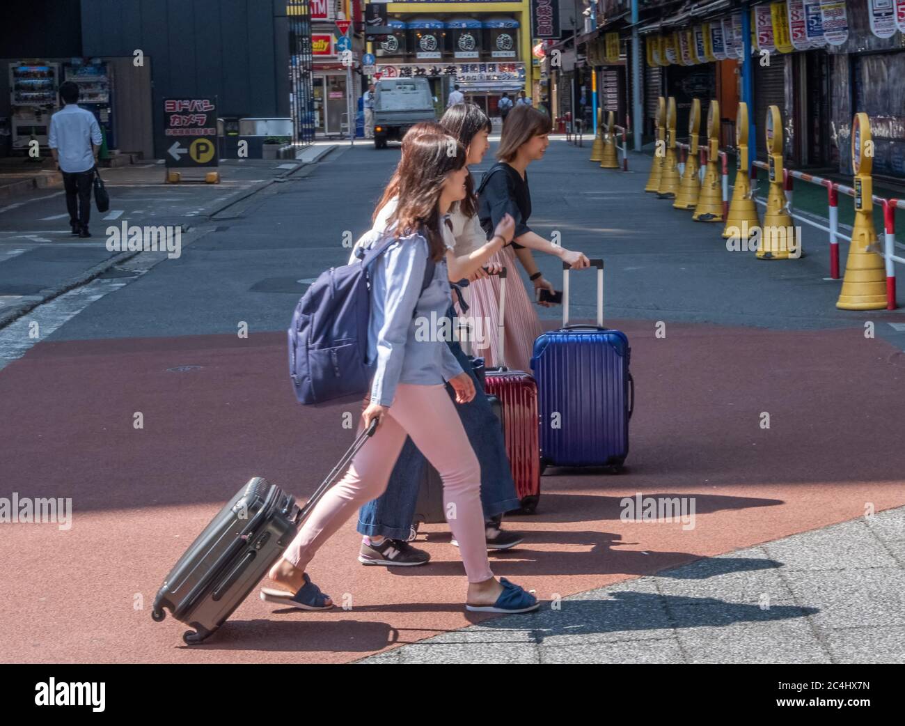 Japanese girls walking in the street of Shinjuku, Tokyo, Japan Stock ...