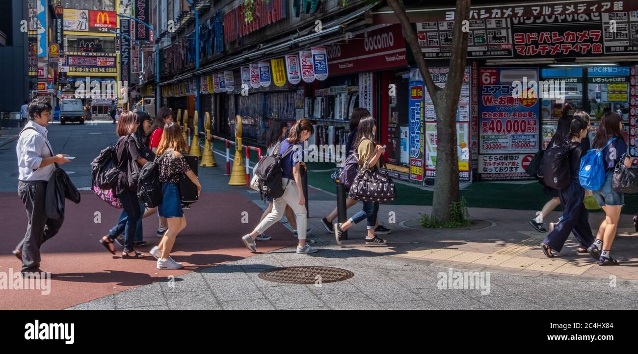 Japanese girls walking in the street of Shinjuku, Tokyo, Japan Stock ...