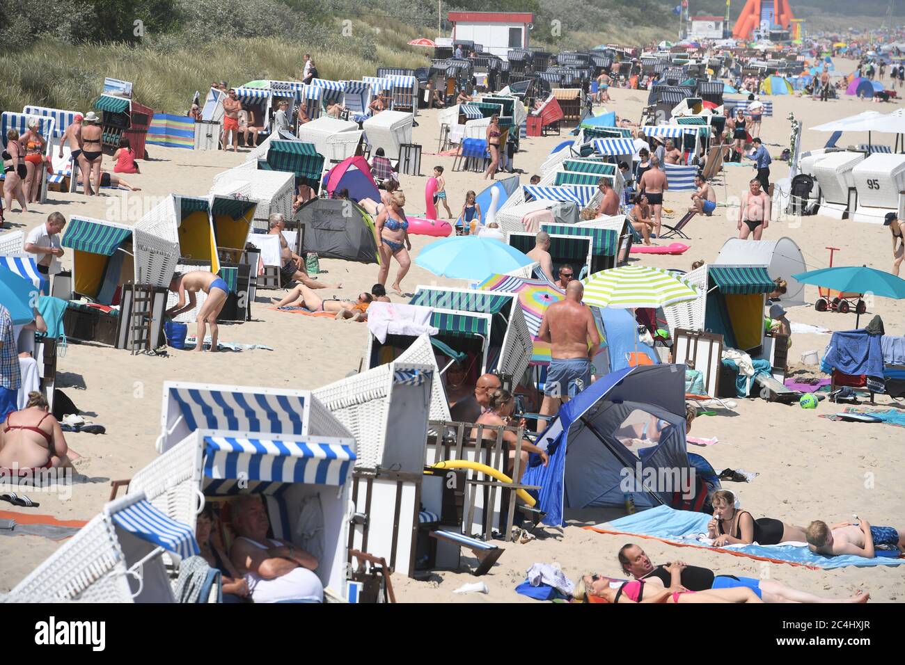 Zinnowitz, Germany. 27th June, 2020. Tourists use the high summer ...