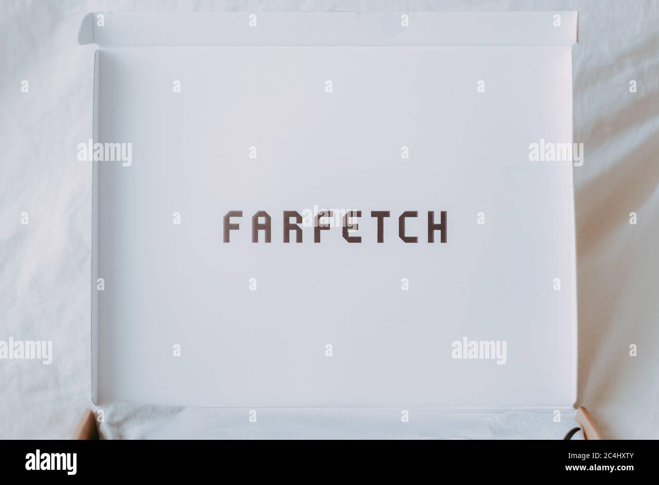 FARFETCH online luxury clothing store Stock Photo - Alamy