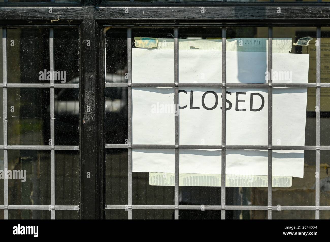 "Closed" sign on the window of a restaurant which has closed down Stock ...