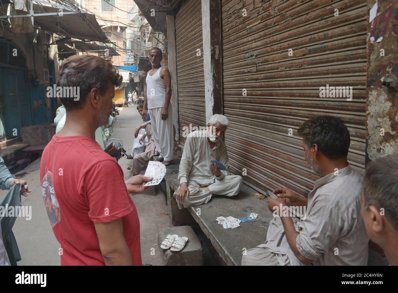 Lahore, Pakistan. 27th June, 2020. Pakistani people busy in their ...