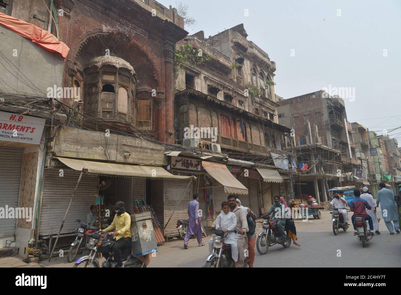 Lahore, Pakistan. 27th June, 2020. Pakistani people busy in their ...