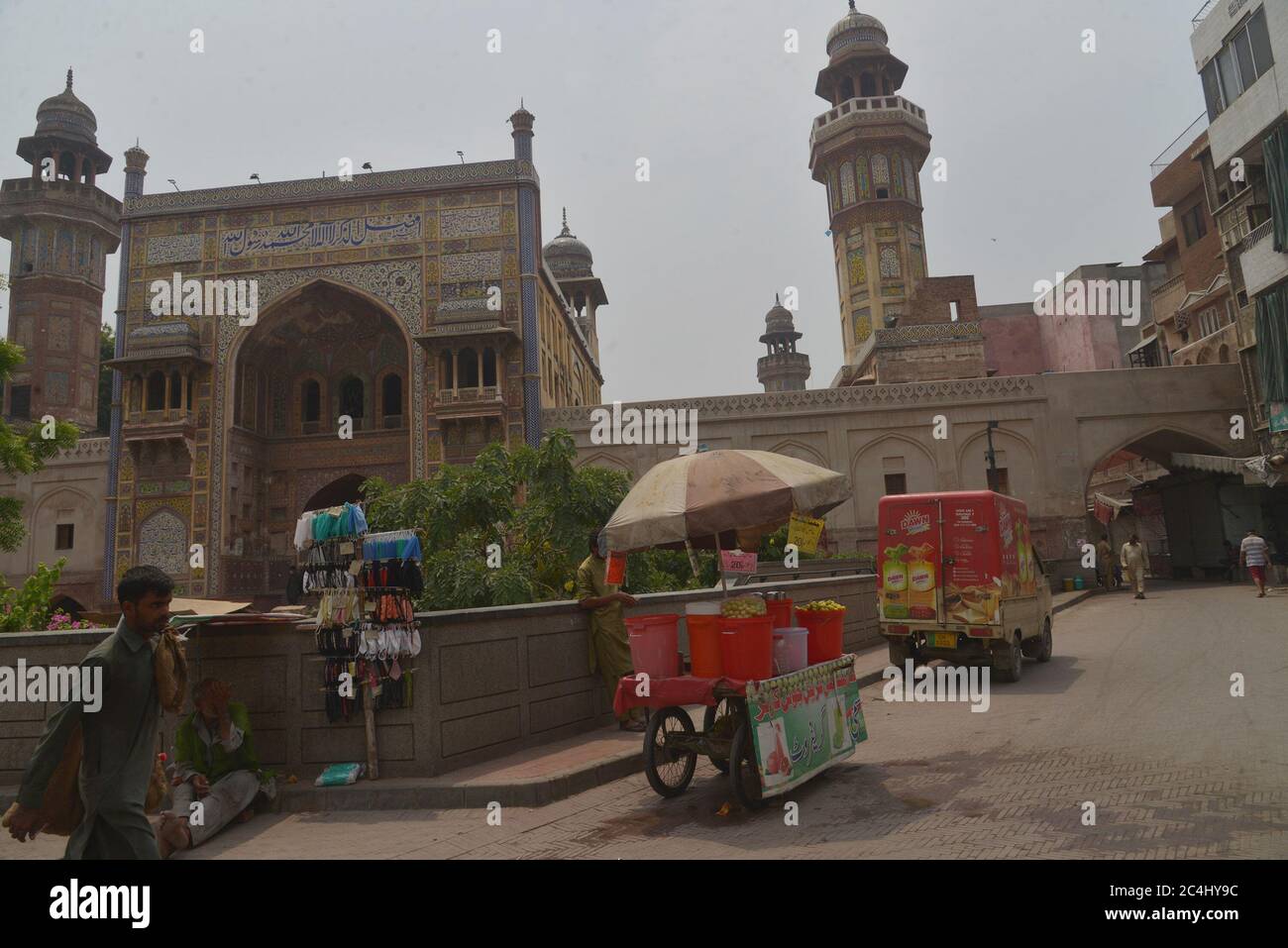 Lahore, Pakistan. 27th June, 2020. Pakistani people busy in their ...