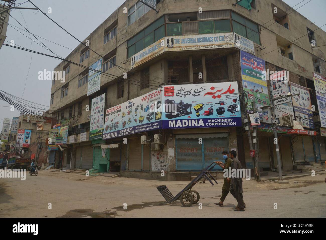Lahore, Pakistan. 27th June, 2020. Pakistani people busy in their ...