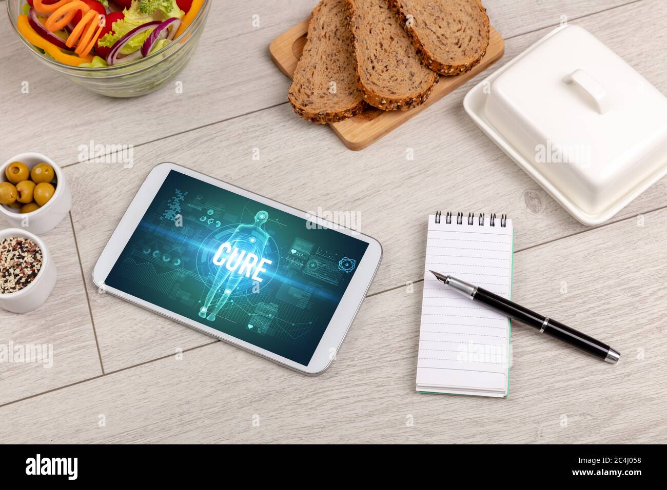 CURE concept in tablet with fruits, top view Stock Photo - Alamy