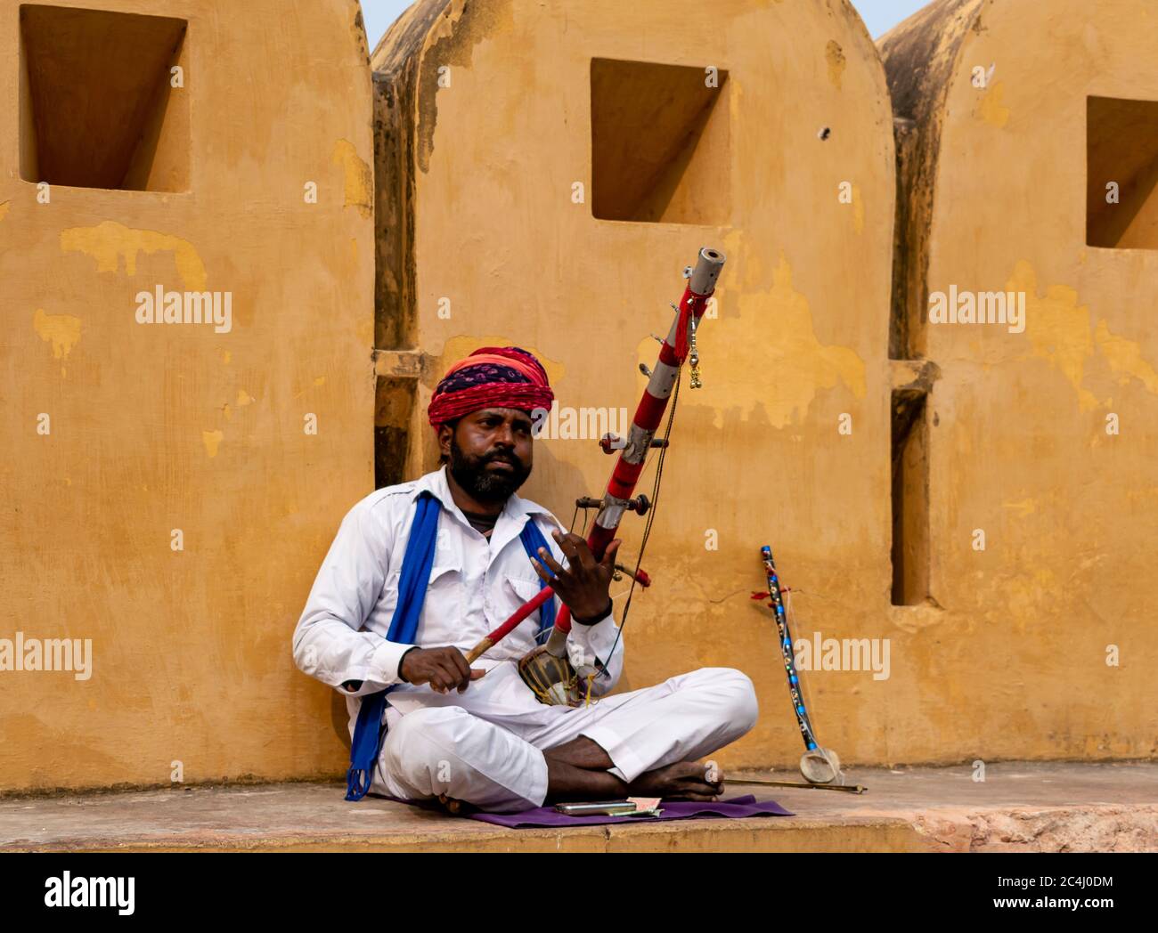 Rajasthan, India; Feb,2020 : a folk musician playing his instrument ...