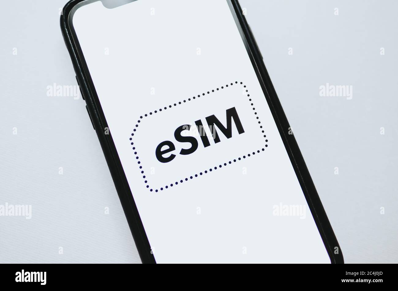 eSIM card chip logo on the smartphone screen Stock Photo - Alamy