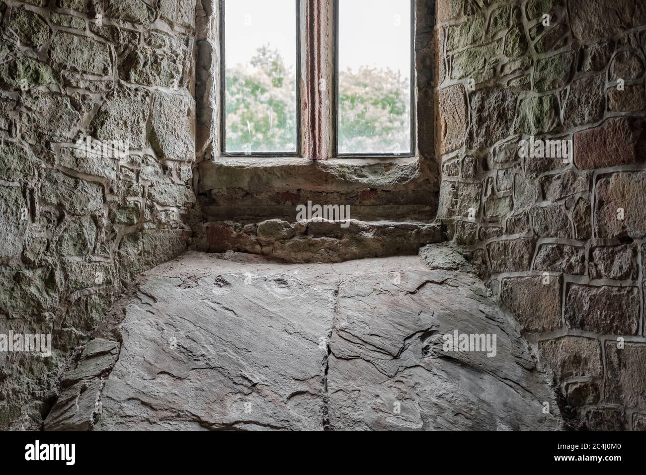 Atmospheric view of a medieval building seen from within, looking out ...
