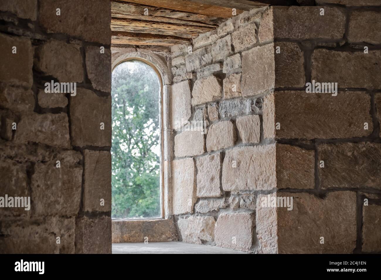 Detailed view of the interior, looking out of a medieval building. The ...