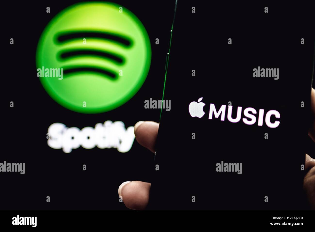Screen shot of Apple music app and Spotify Stock Photo - Alamy