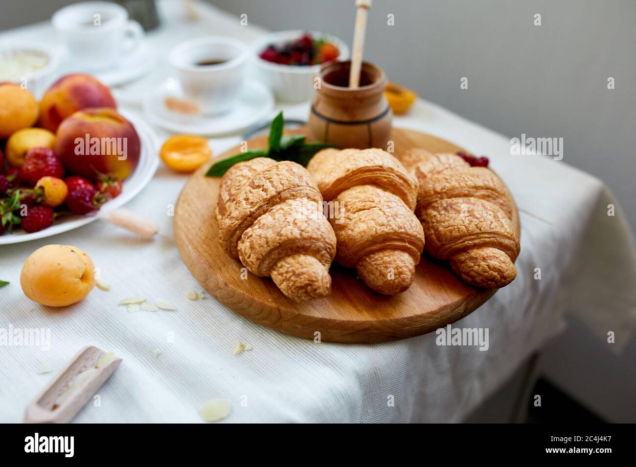 Continental breakfast table served with traditional French croissant ...