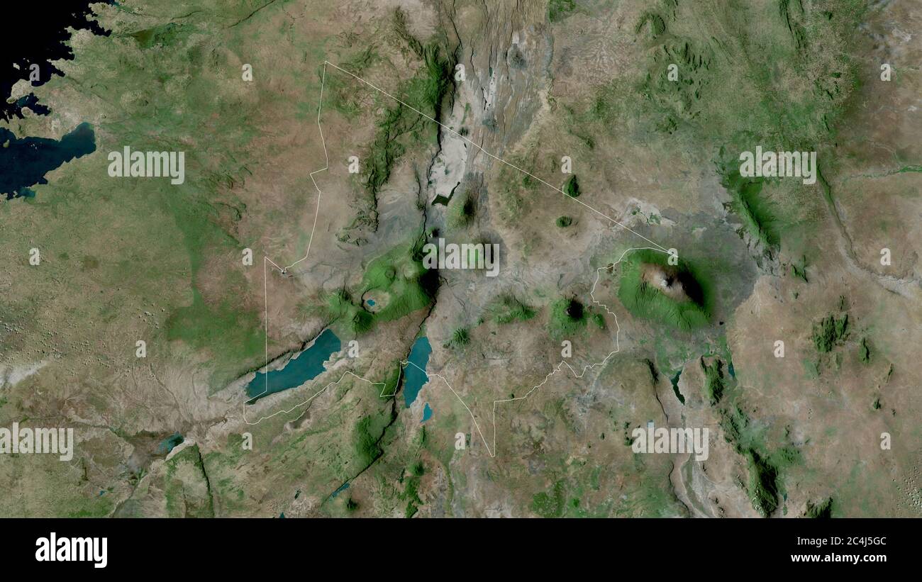 Arusha, region of Tanzania. Satellite imagery. Shape outlined against ...