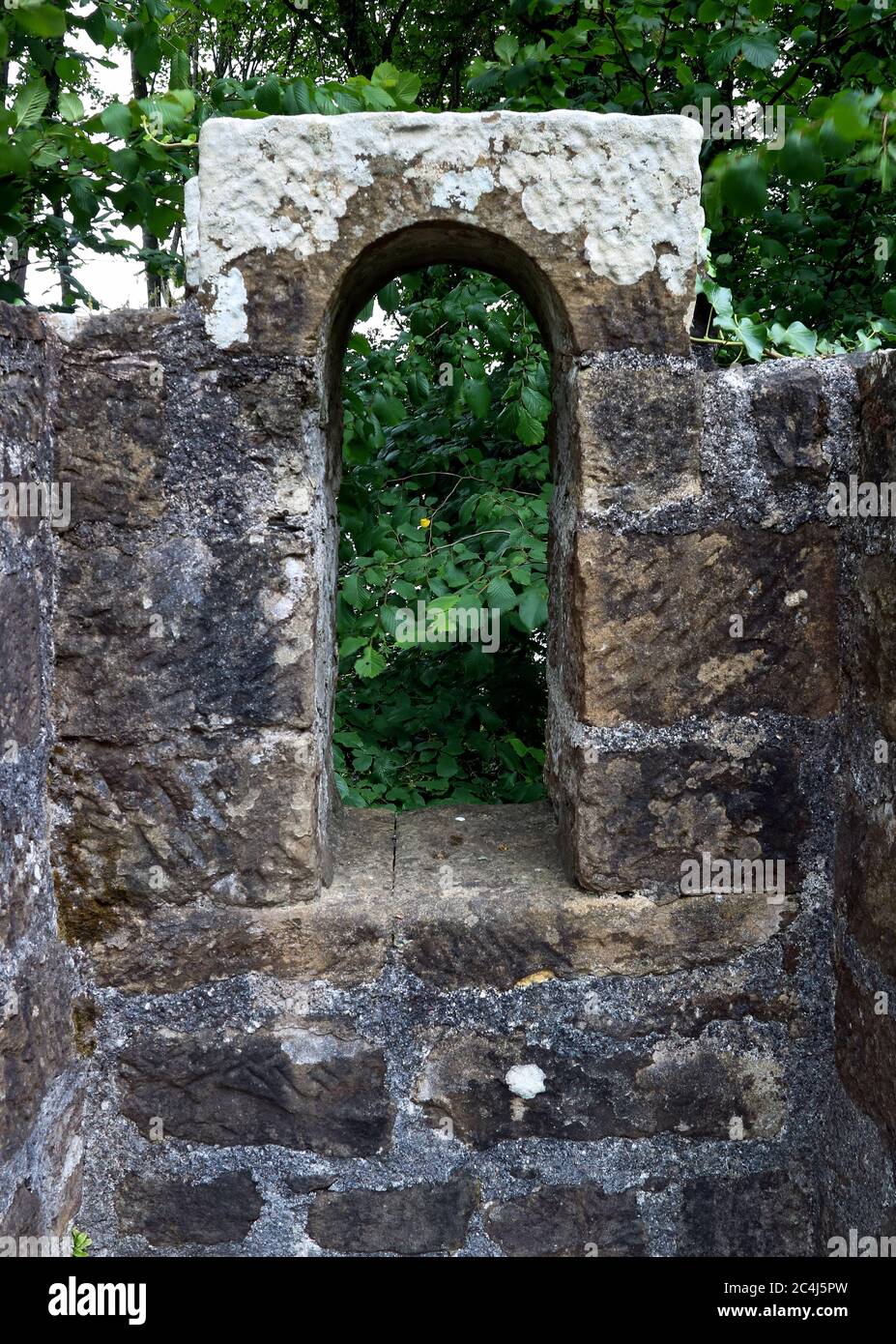 Ancient stone arch window in a country estate Stock Photo - Alamy