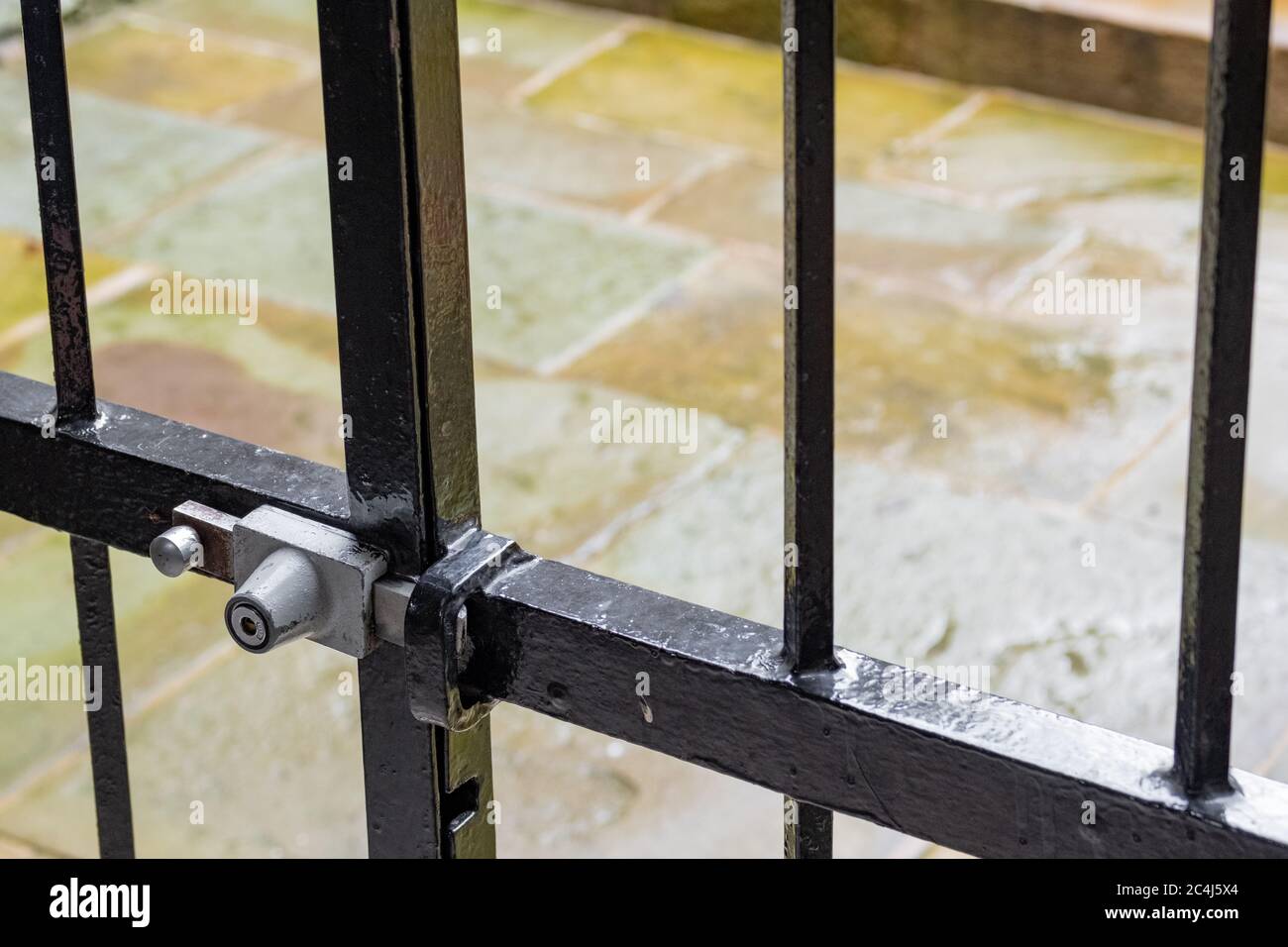 Detailed view of a locked jail and dungeon entrance area, once ...