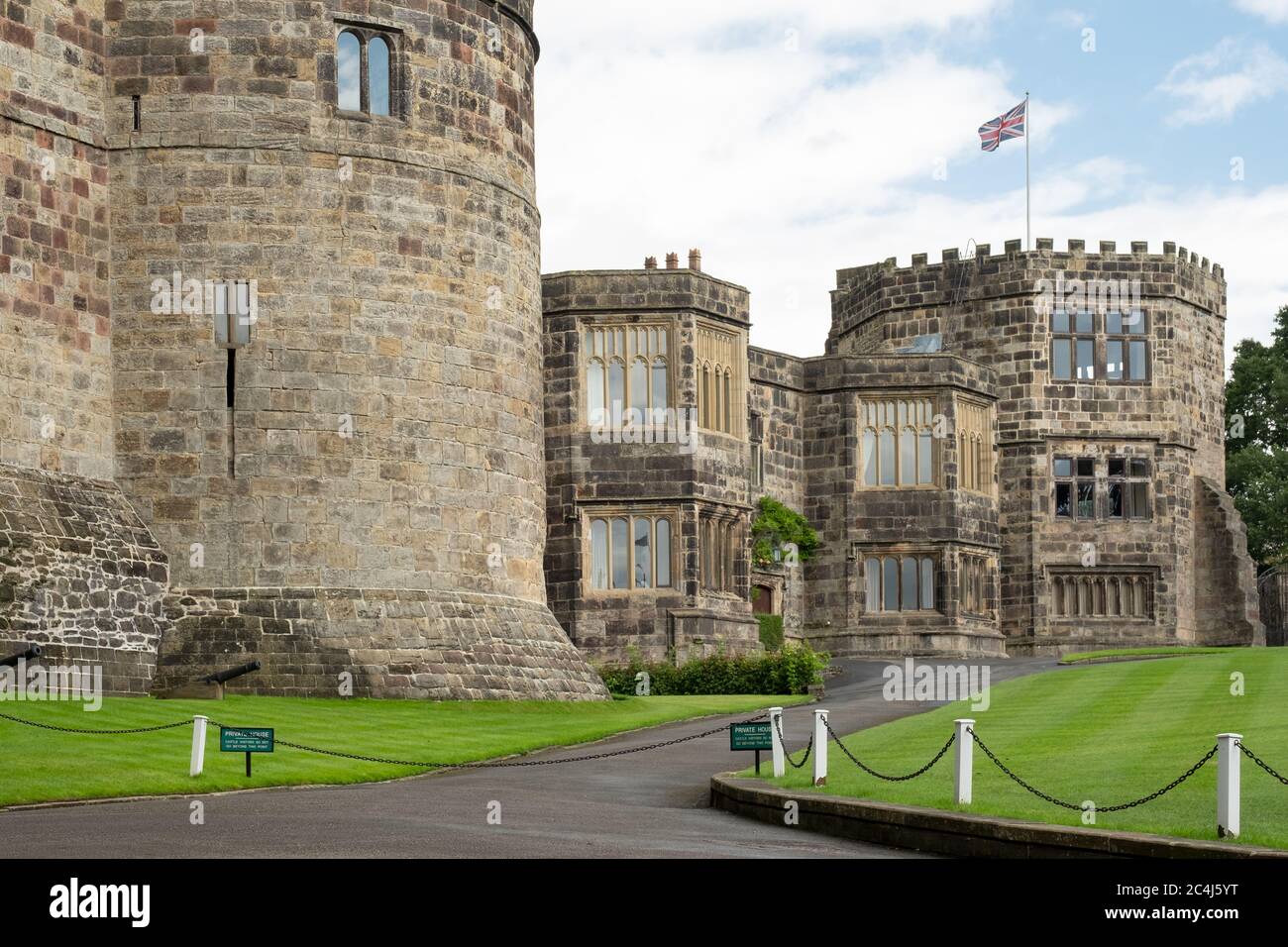 Grand view of a stately home seen in its architectural glory. The lush ...