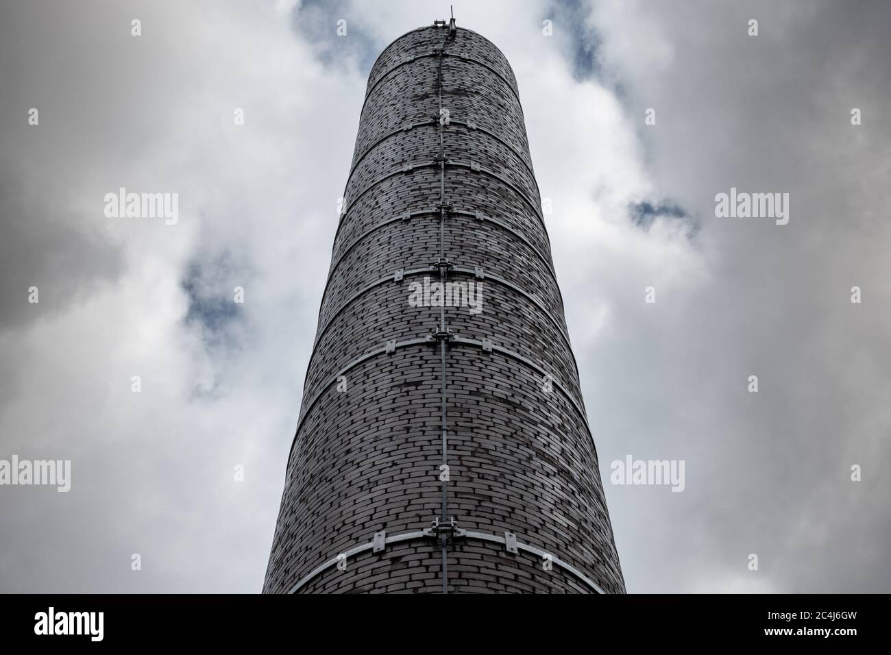 Old-style mill factory showing the individual roof structures. A large ...
