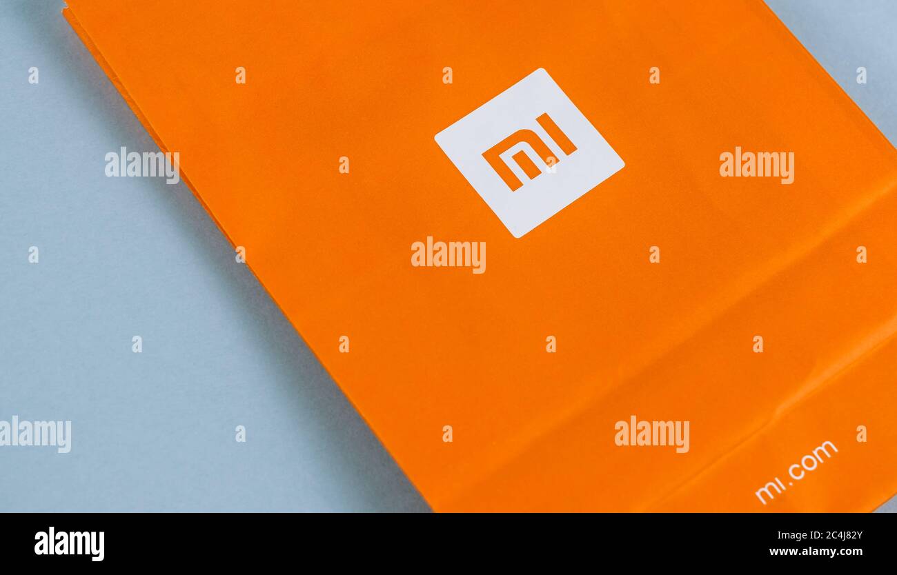 Xiaomi logo on an orange background Stock Photo - Alamy