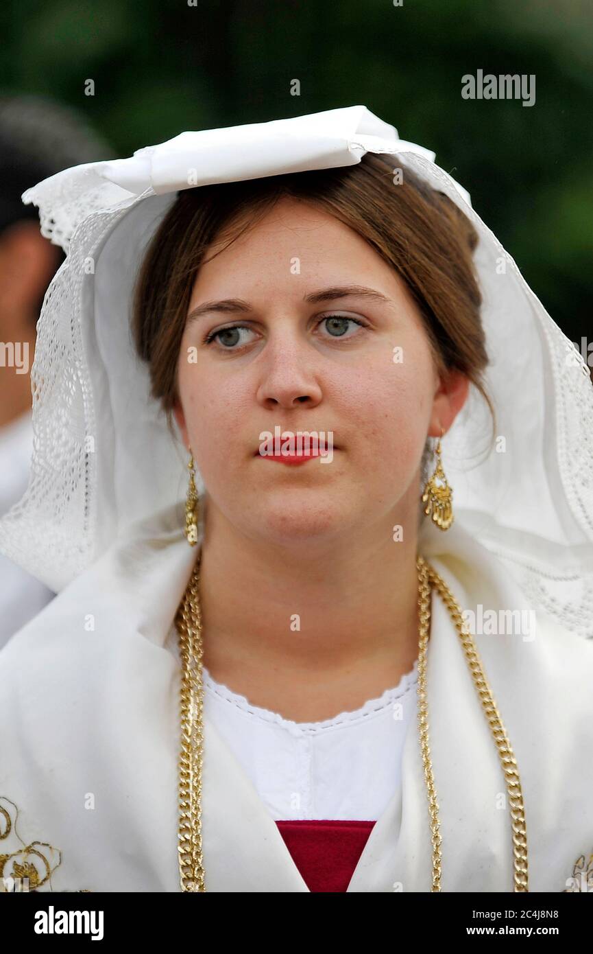 Woman in traditional costume - called 'pacchiana' - during religious ...