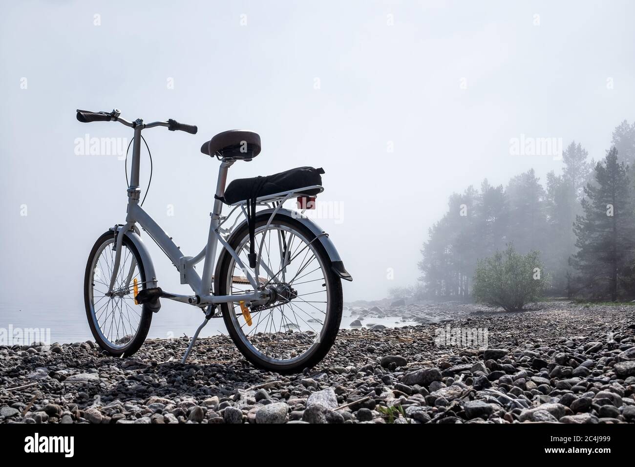 Bicycle on natural rocky beach outdoors background Stock Photo - Alamy