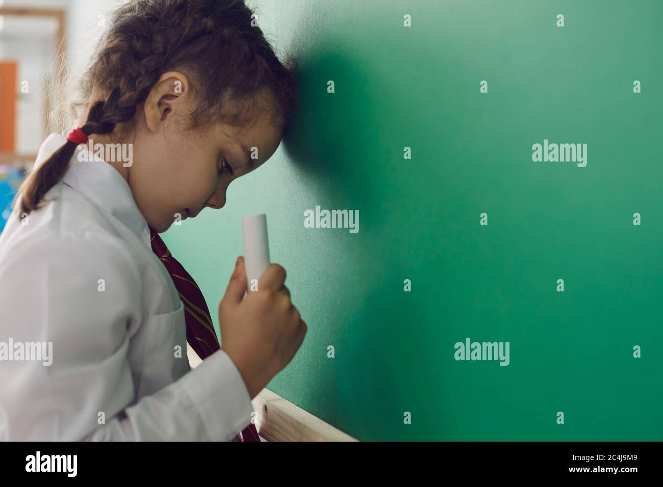 Sad child classroom hi-res stock photography and images - Alamy