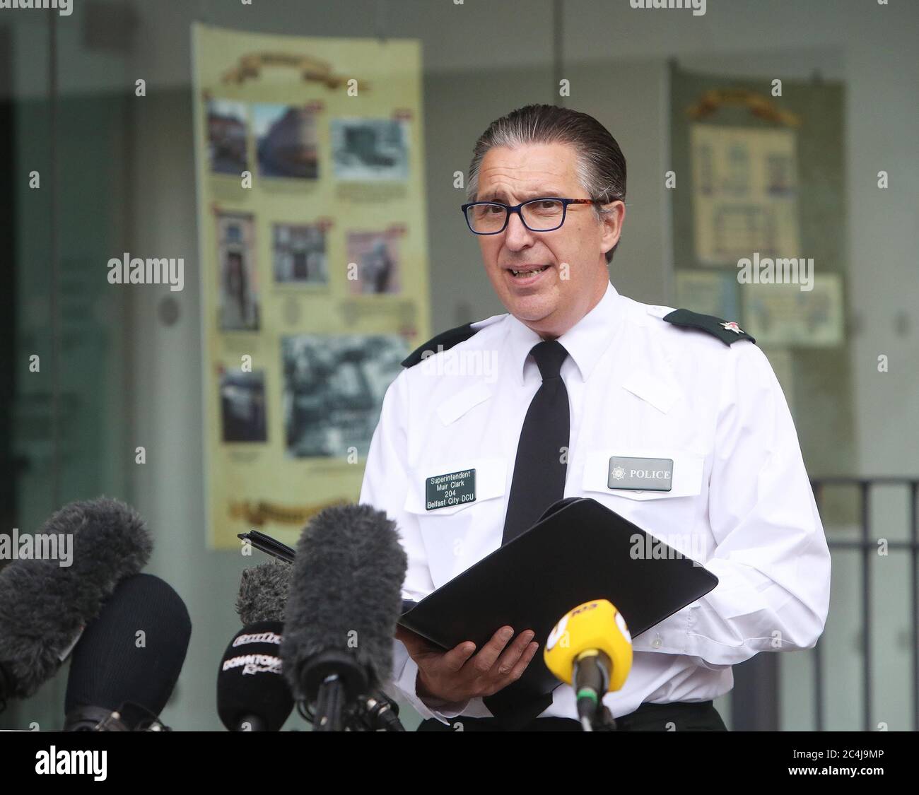 Psni superintendent muir clark speaks hi-res stock photography and ...