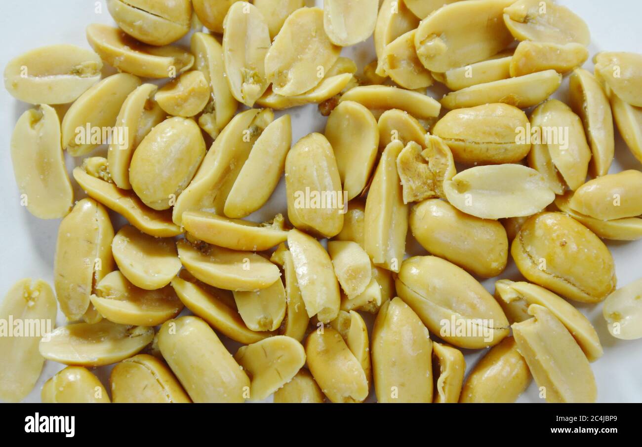 baked salt peanuts on white background Stock Photo - Alamy