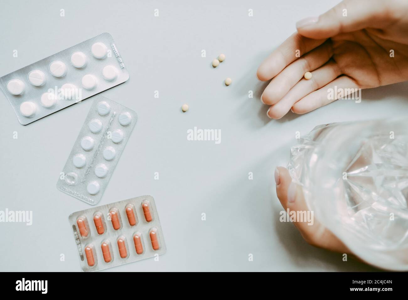 Hands holding the tablets pack Stock Photo - Alamy