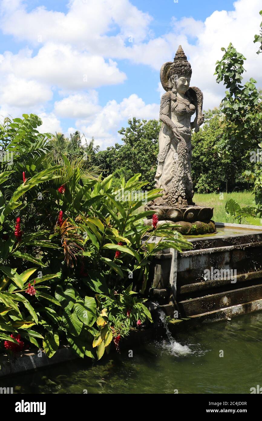 Carving dewi sri rice goddess hi-res stock photography and images - Alamy