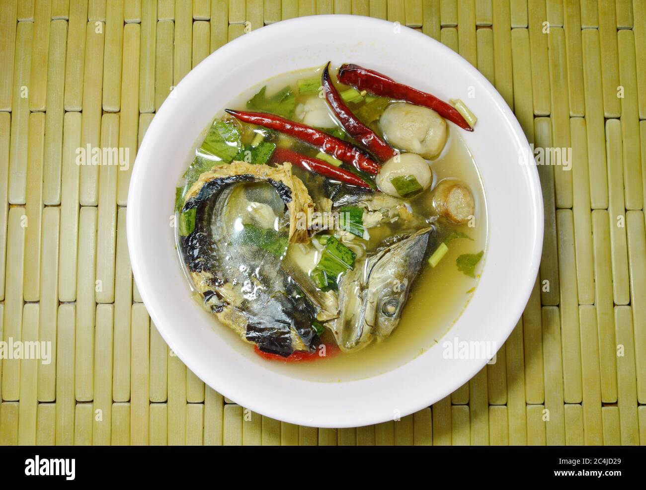 boiled smoked dry snake head fish in spicy and sour soup on bowl Stock ...